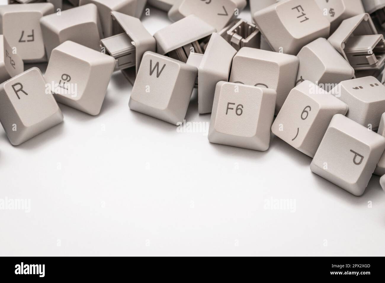 Close-up view of pile of computer keyboard keys. Computer repair ...