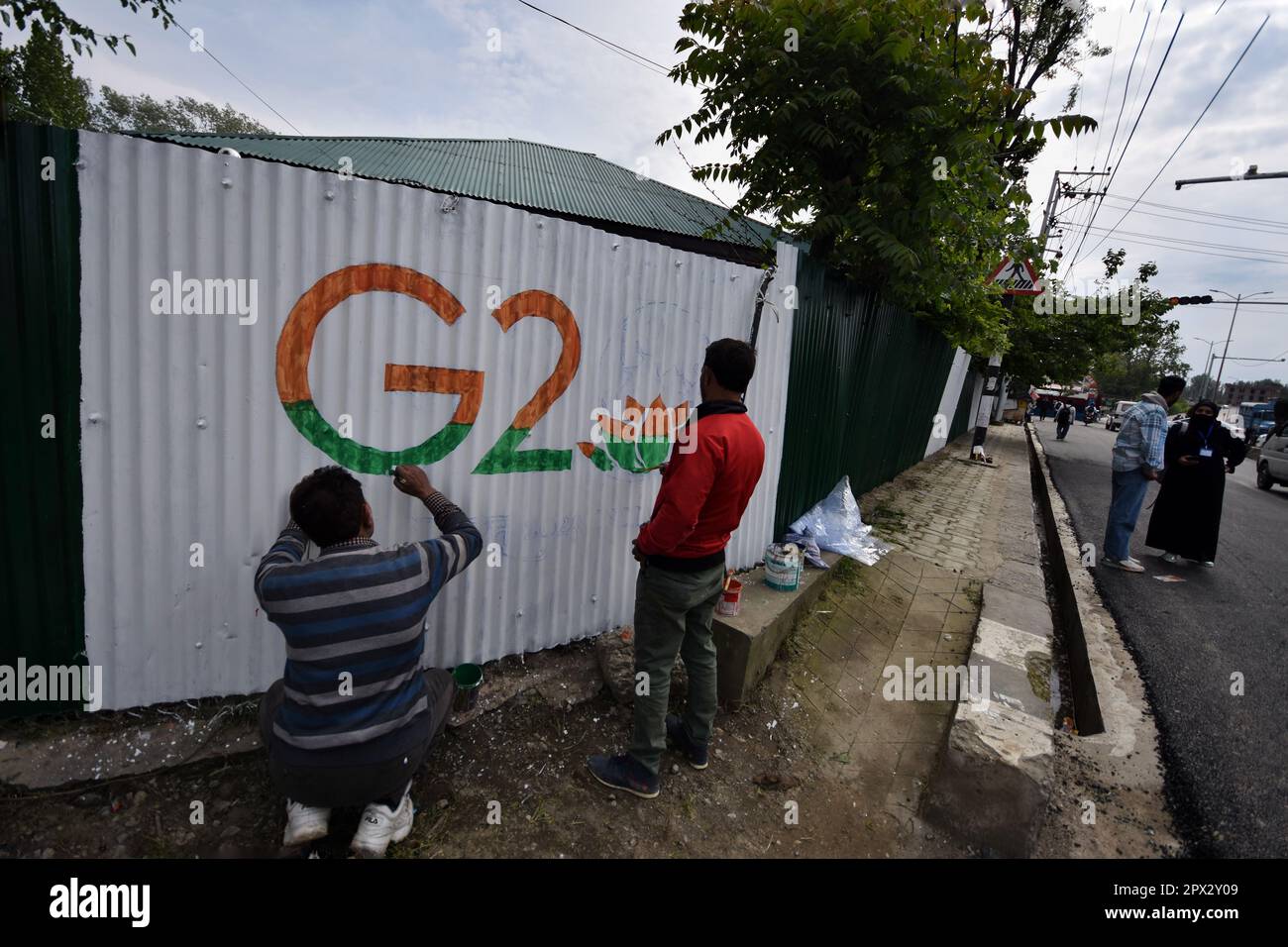 Srinagar, India. 01st May, 2023. Local Kashmiri artists draw graffiti ...