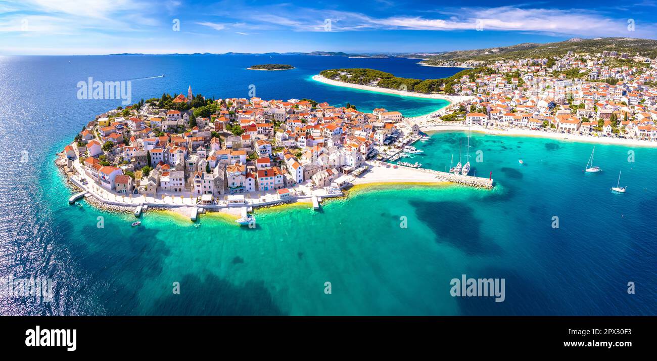Scenic town and beaches of Primosten aerial panoramic view, turquoise ...