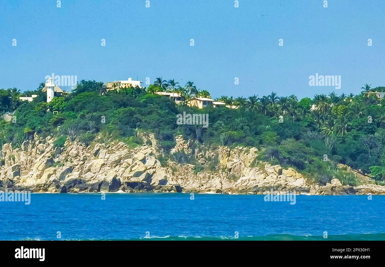 Sun beach people waves and boats in Zicatela Puerto Escondido Oaxaca ...