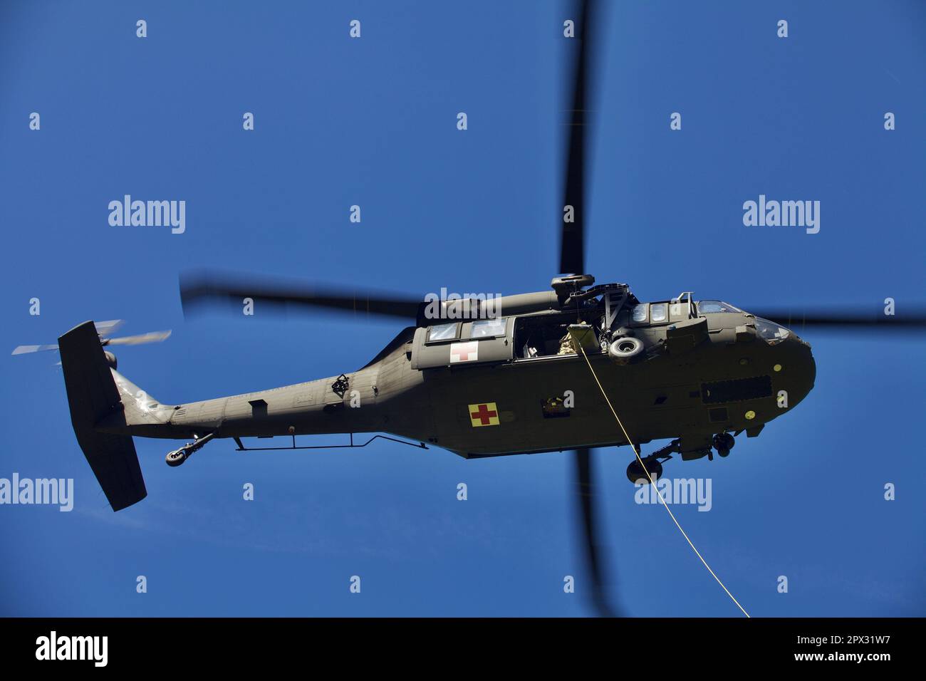 A U.S. Army UH-60 Black Hawk Crew Chief, assigned to 4th Ranger ...