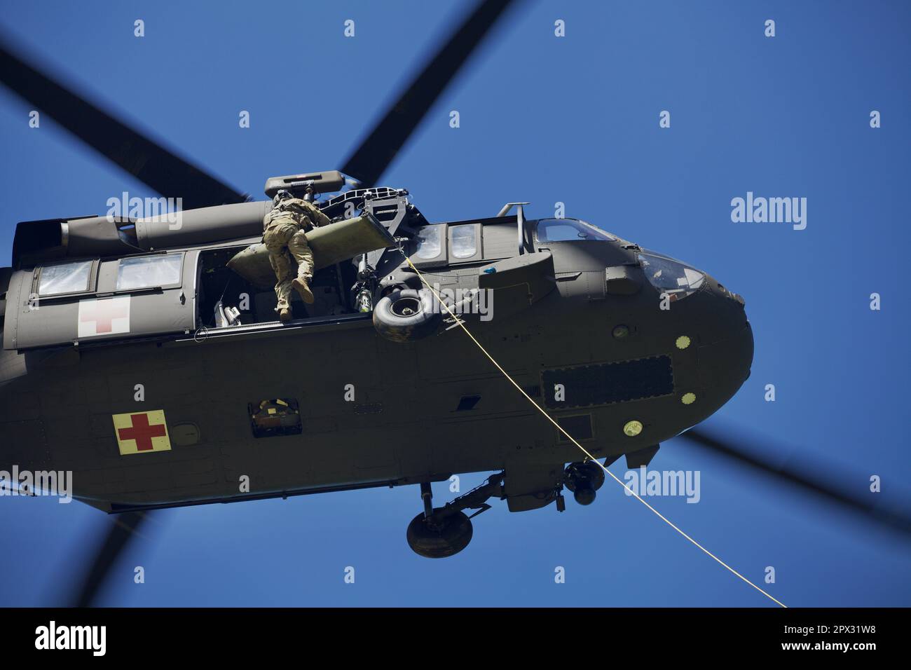 A U.S. Army UH-60 Black Hawk Crew Chief, assigned to 4th Ranger ...