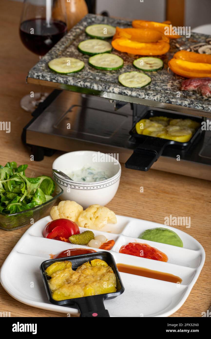Raclette cheese potatoes ham hi-res stock photography and images - Alamy
