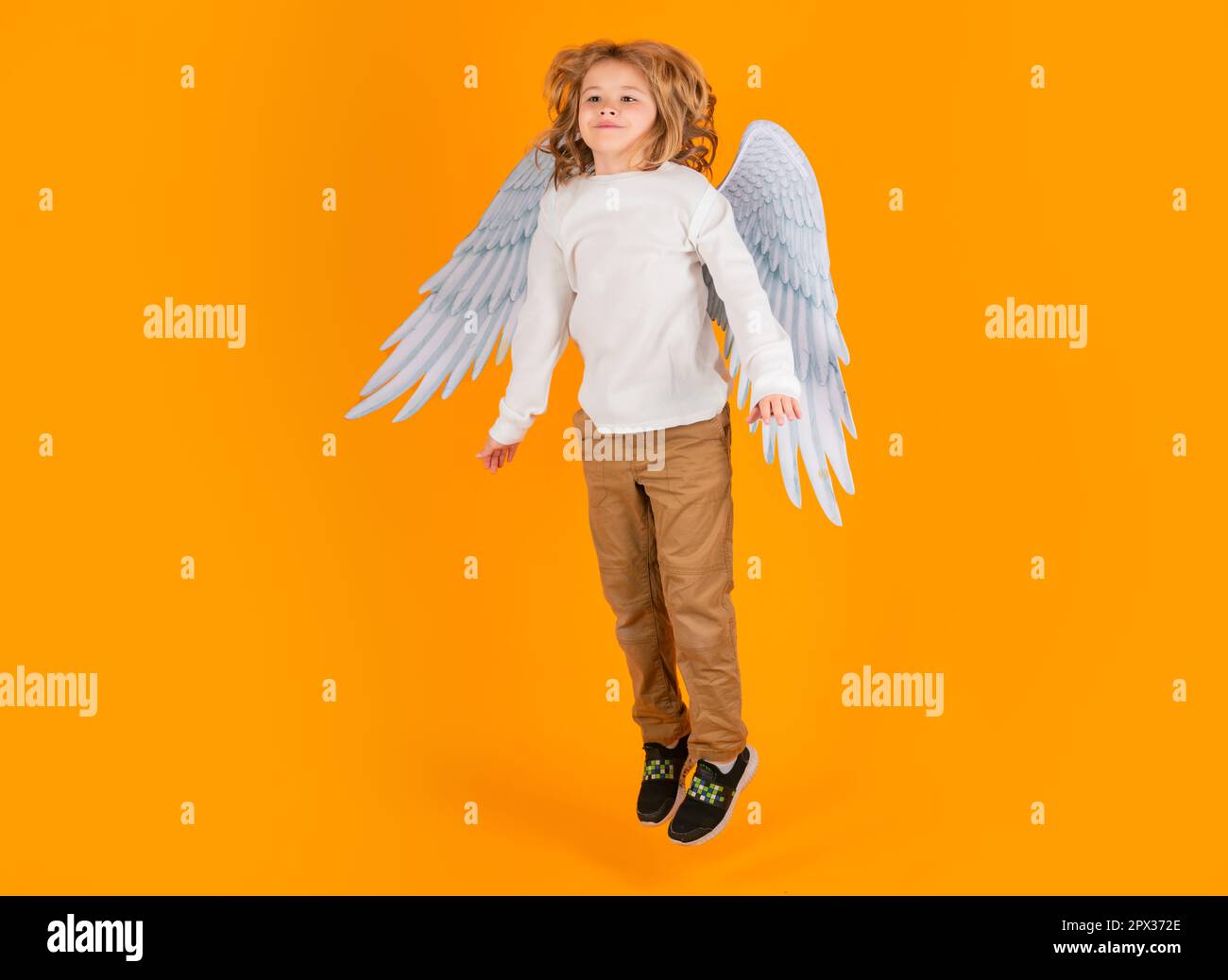 Little angel jump, kids jumping, full body. Child angel. Portrait of ...