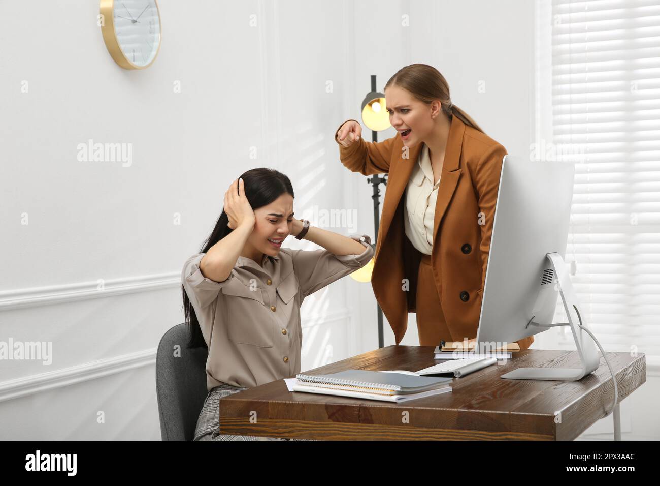 Boss screaming at employee in office. Toxic work environment Stock ...