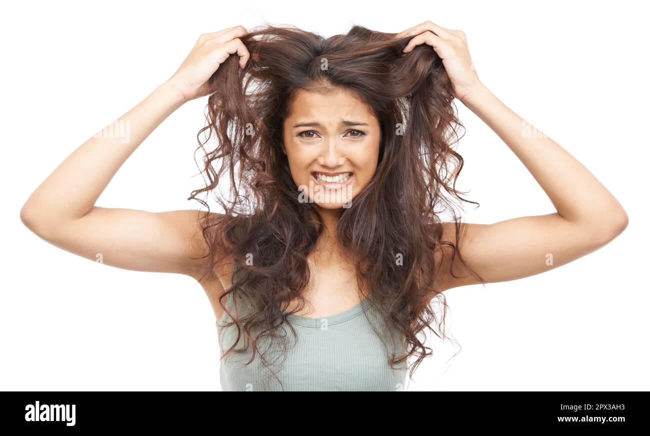 Split ends are the worst. A beautiful woman looking at the camera ...