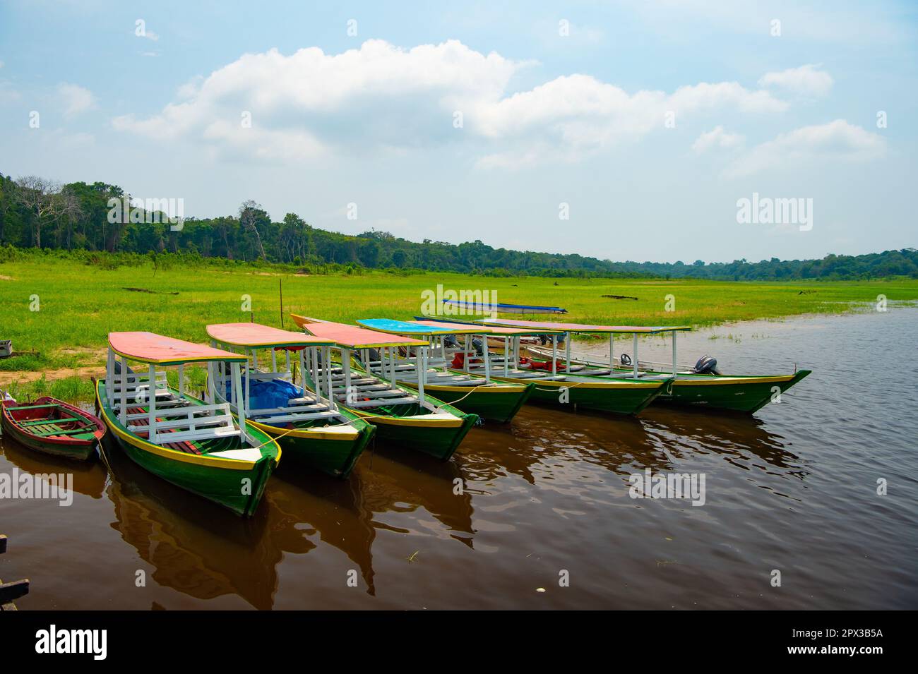 image of boat at riverside. boat at riverside nature. wooden boat at ...
