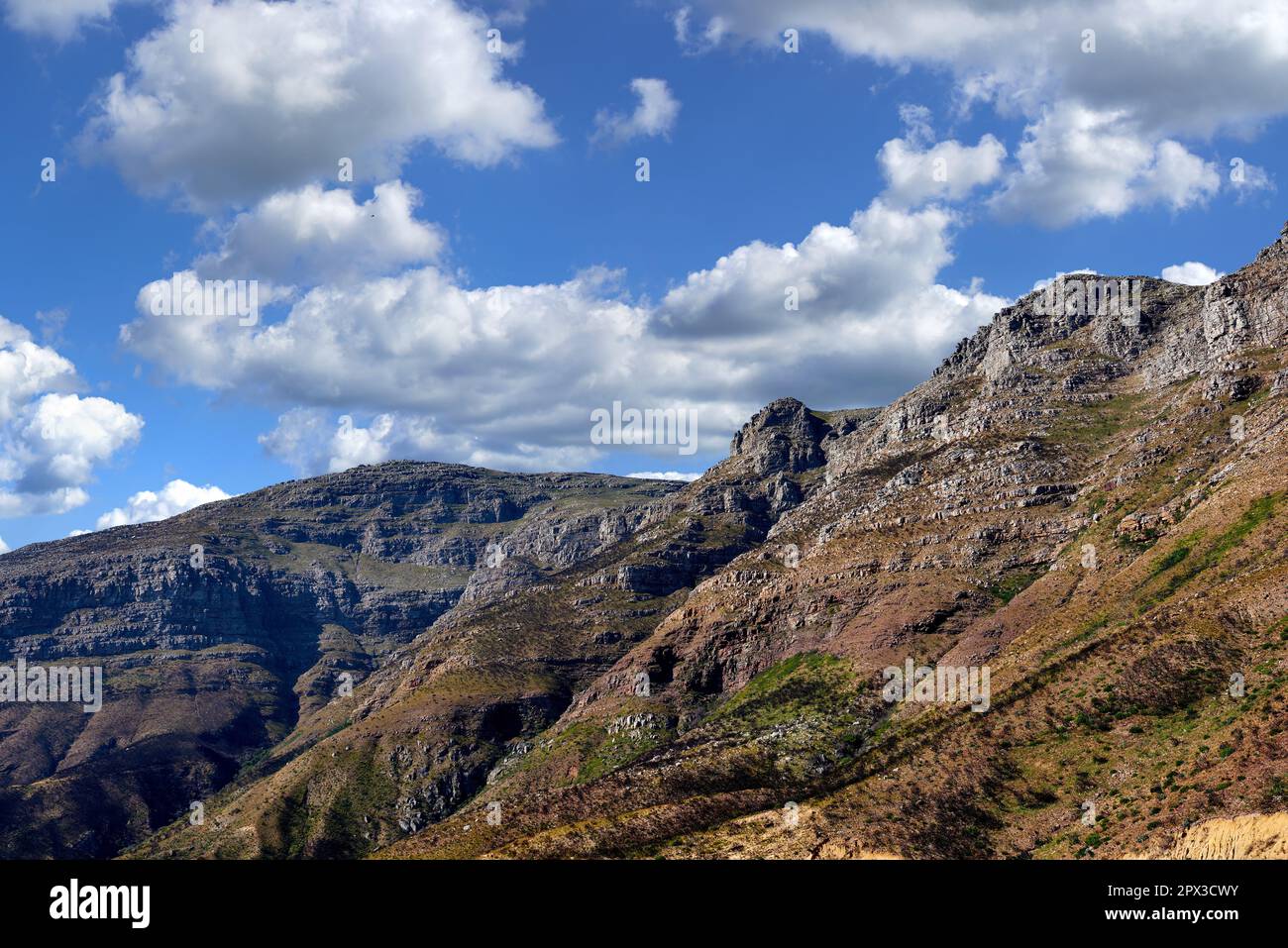 Majestic mountain against a cloudy blue sky background. Beautiful view ...