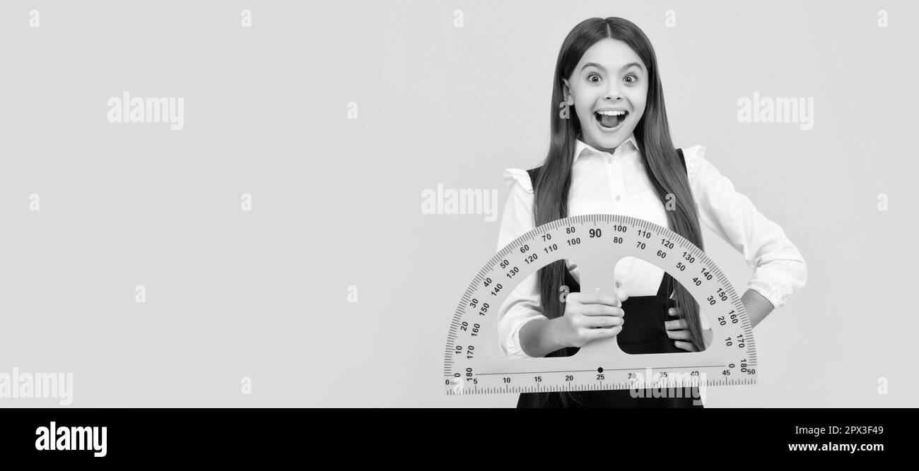 mathematics. surprised teen girl hold protractor ruler. Portrait of ...
