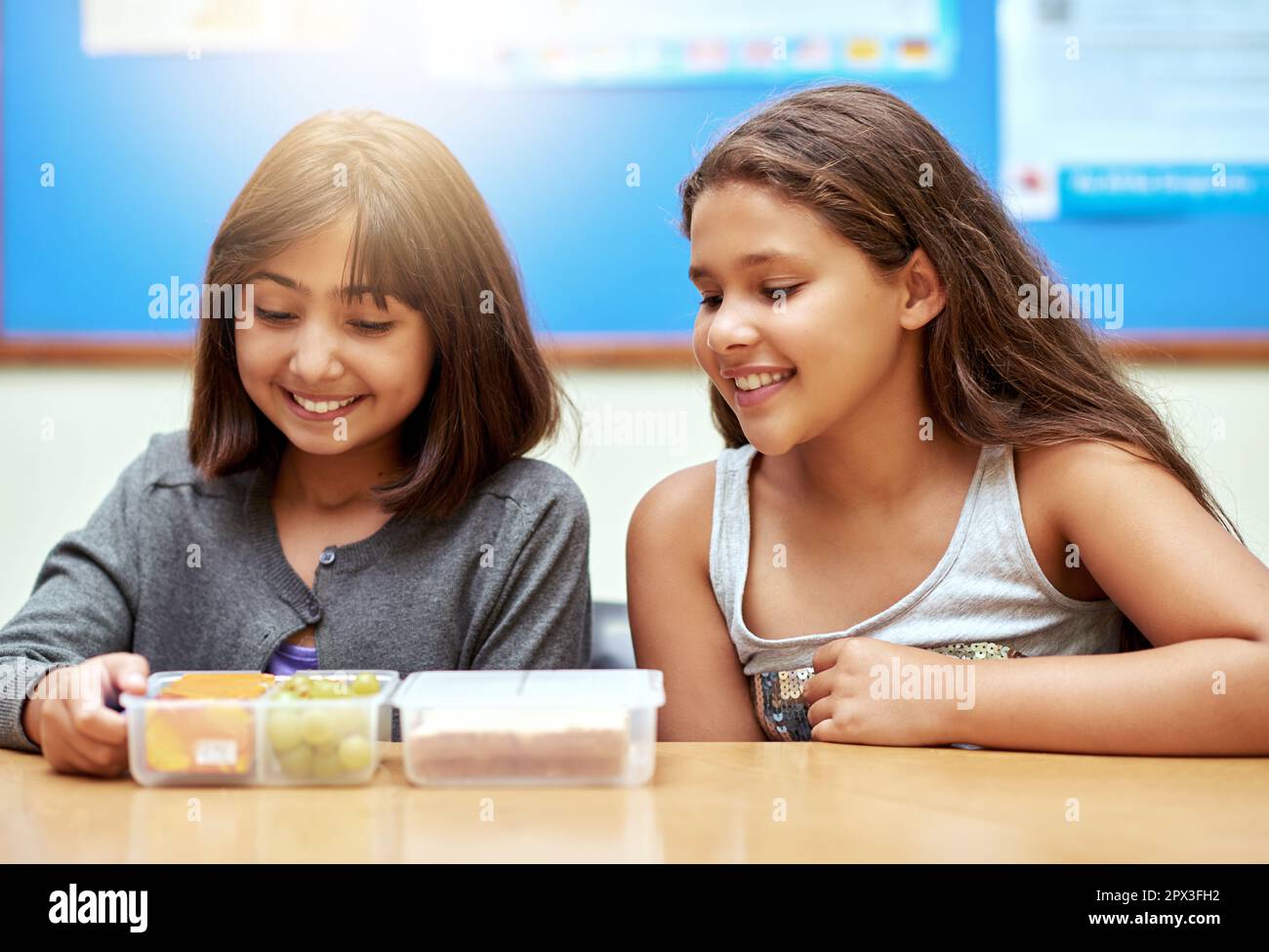What lunch did your mom pack for you. young school children eating ... What lunch did your mom pack for you. young school children eating ...