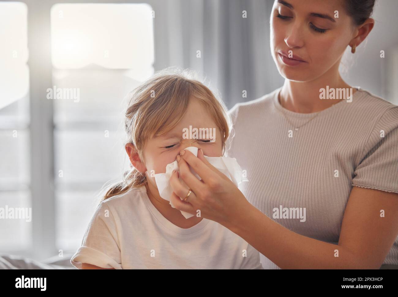 Girls blowing her nose hi-res stock photography and images - Alamy