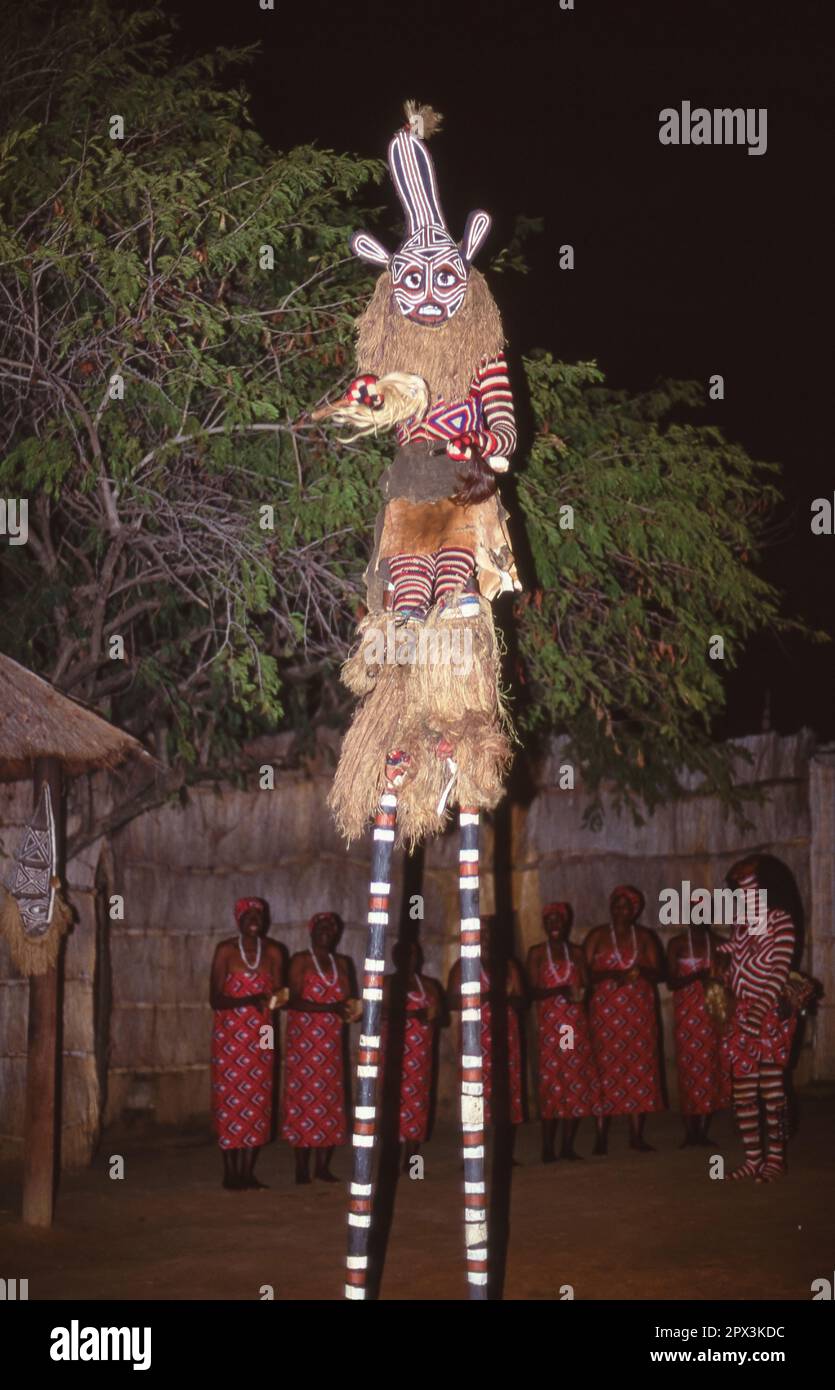 VICTORIA FALLS, ZIMBABWE - MAY 1, 2023: A stilt dancer performing a ...