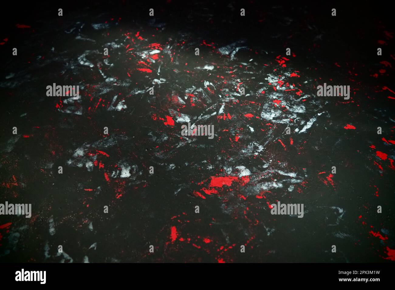 Black background with red, white, gray and blue strokes, dashes, stains ...