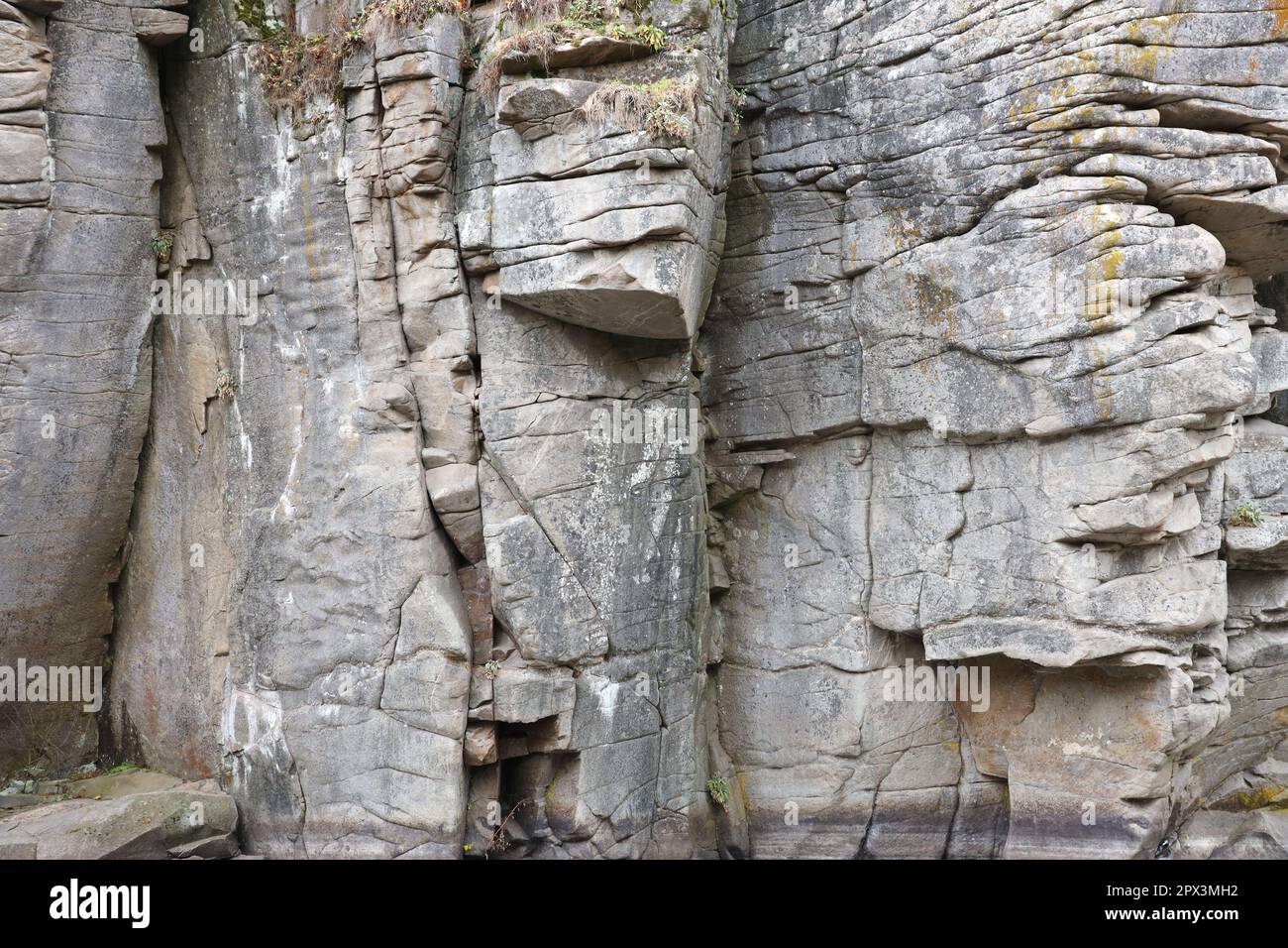Light coarse natural rock stone background. Mining cliff rough front ...