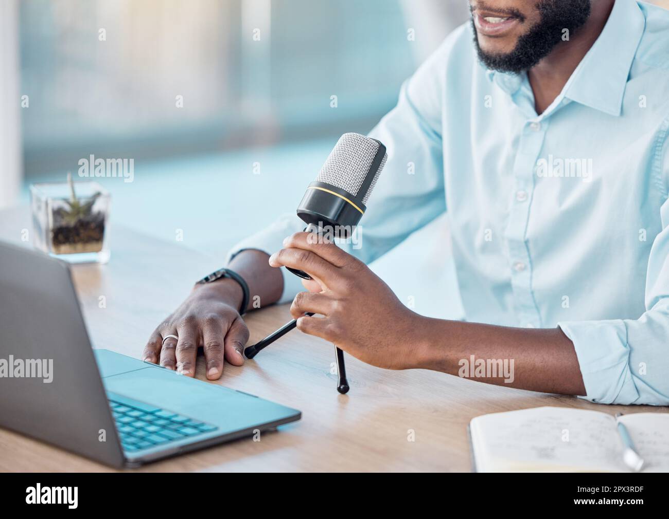 Welcome back to the show. a man hosting a business podcast Stock Photo ...
