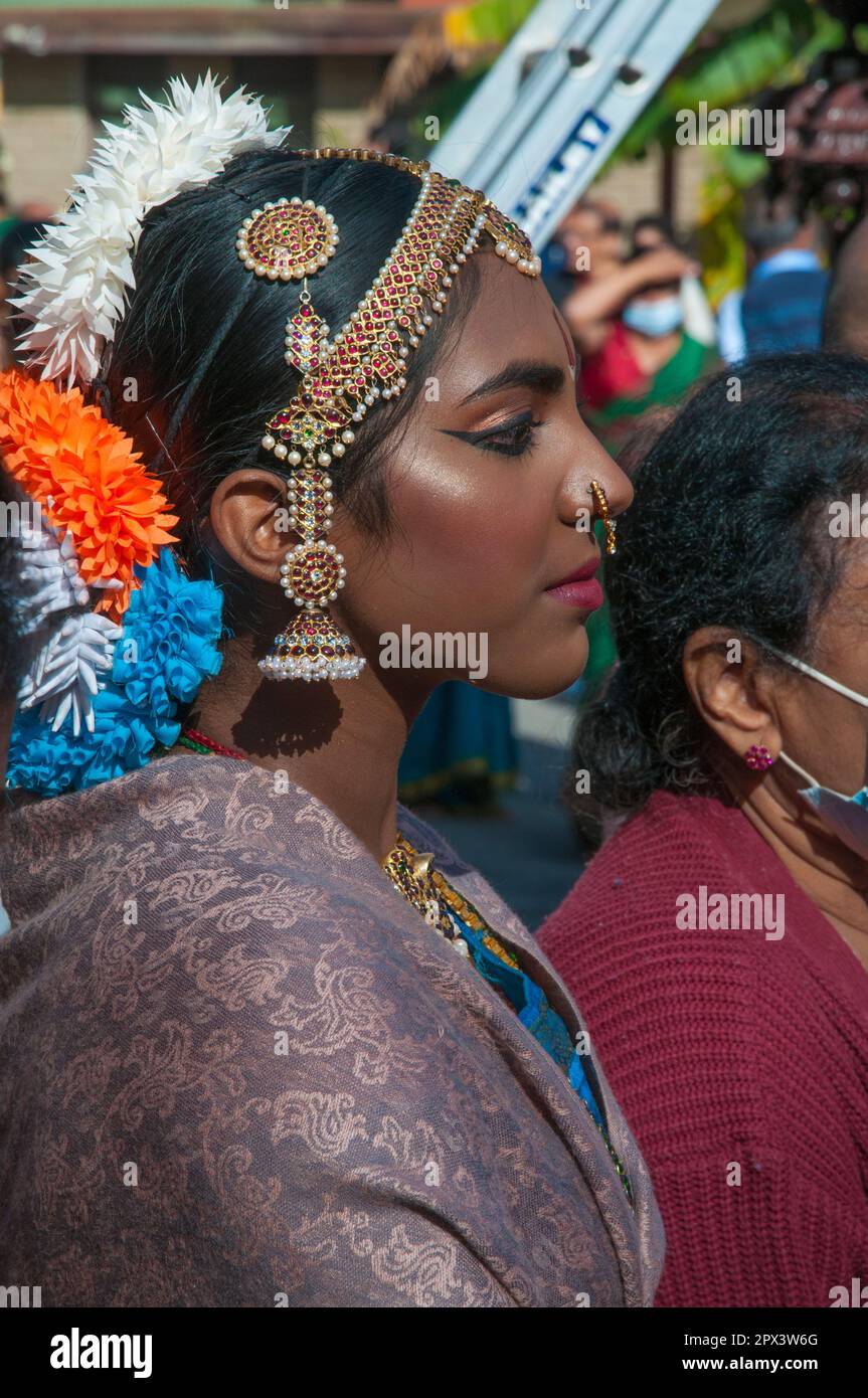 A dancer awaits the moment to perform for the deity at the Tamil Hindu ...