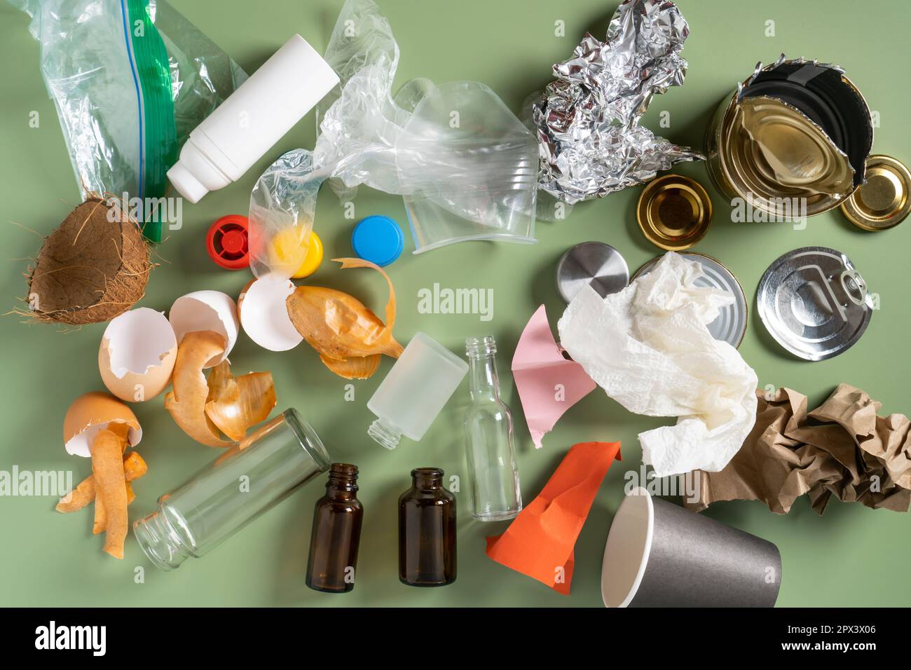 Pile of different of non sorted garbage of plastic, metal, organic ...