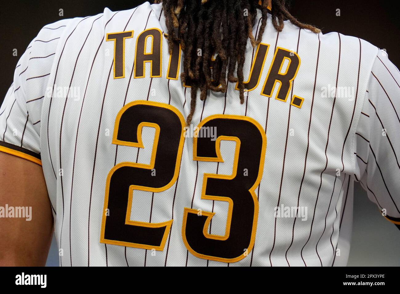 San Diego Padres' Fernando Tatis Jr. stands on first base after hitting ...