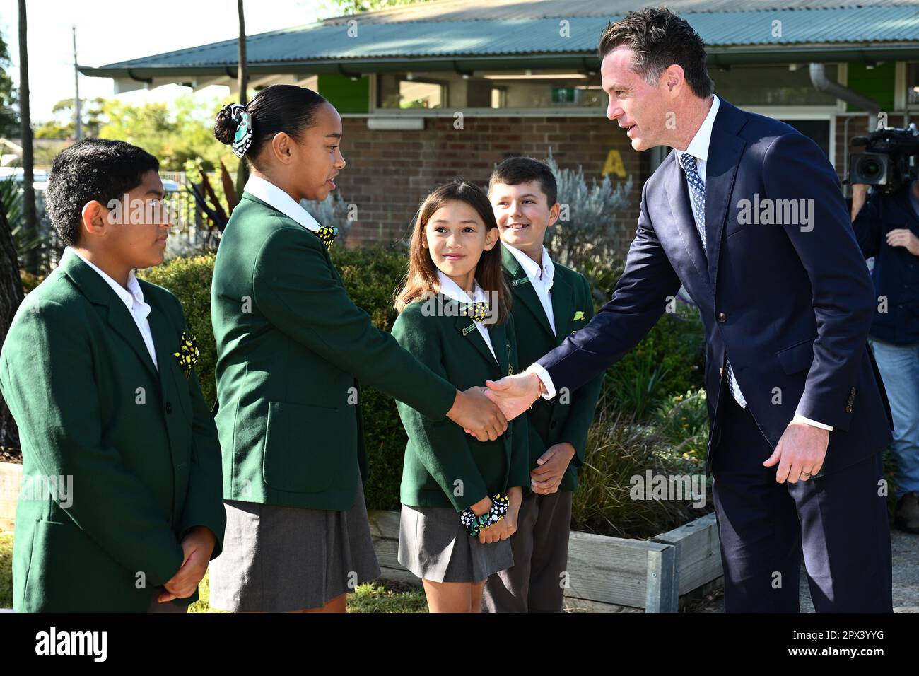 NSW Premier Chris Minns is greeted by students during a visit to ...