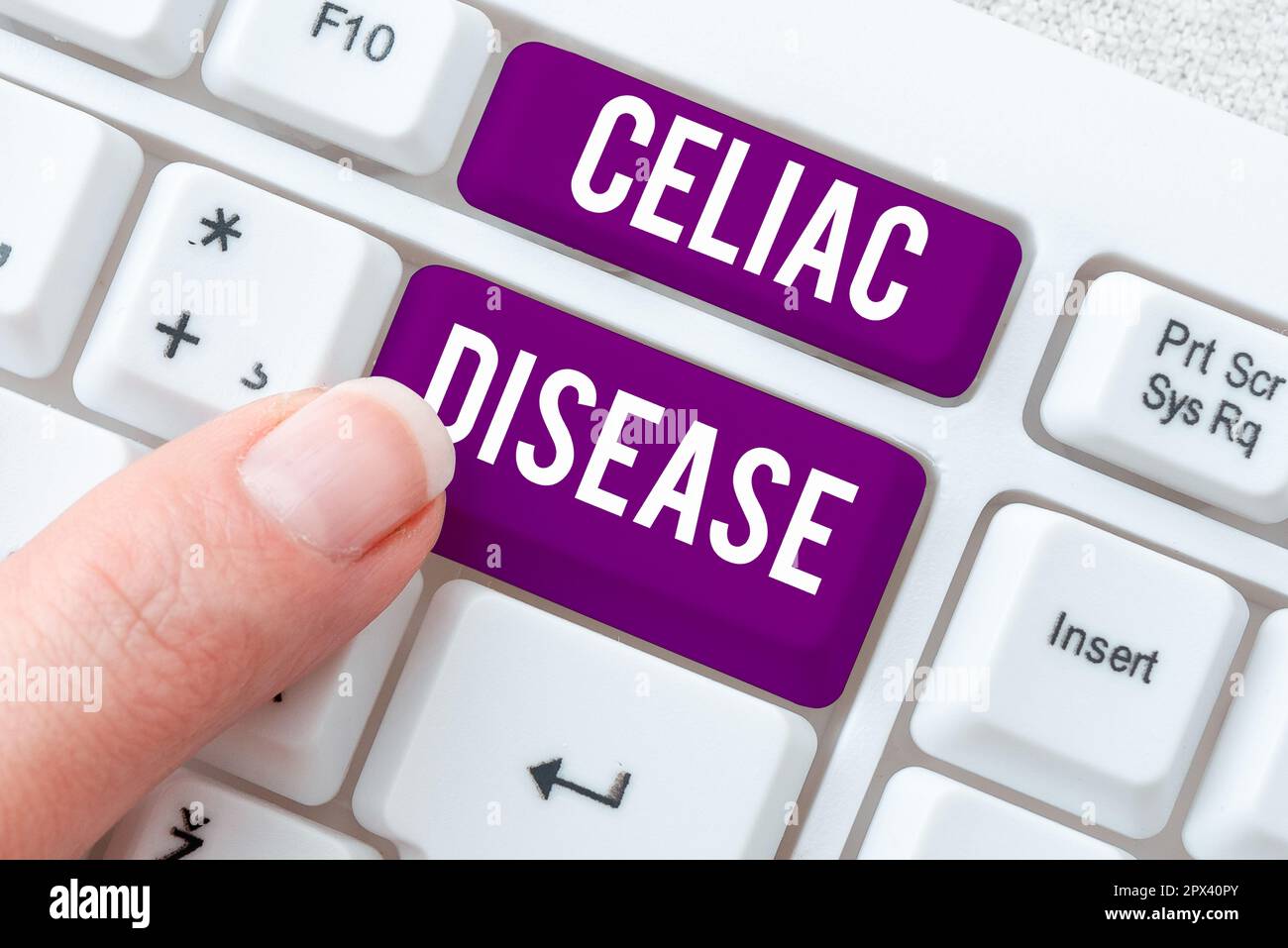 Hand writing sign Celiac Disease, Word for Small intestine is ...