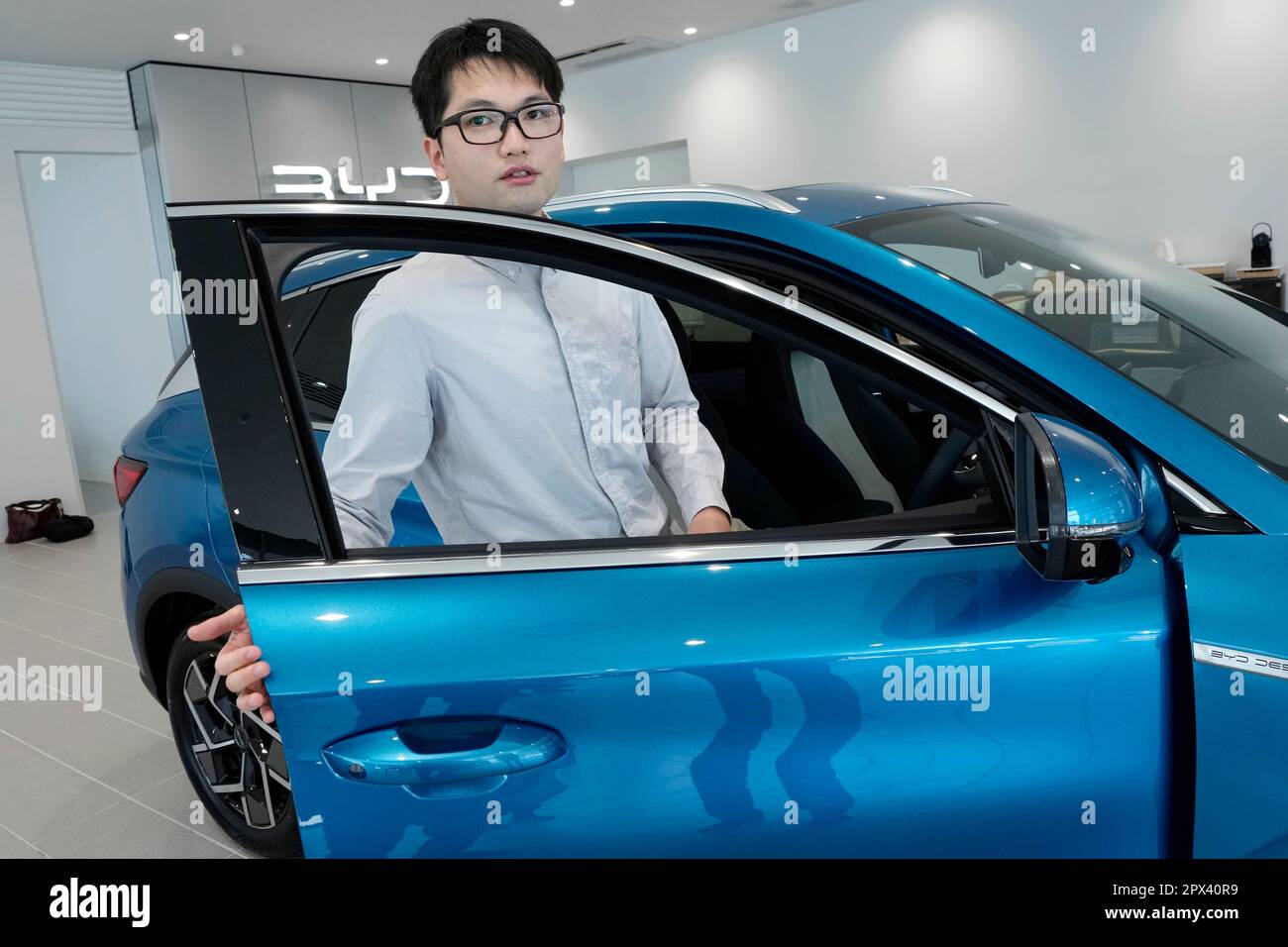 Ohta, who just bought a brand new BYD ATTO 3 electric sports utility ...