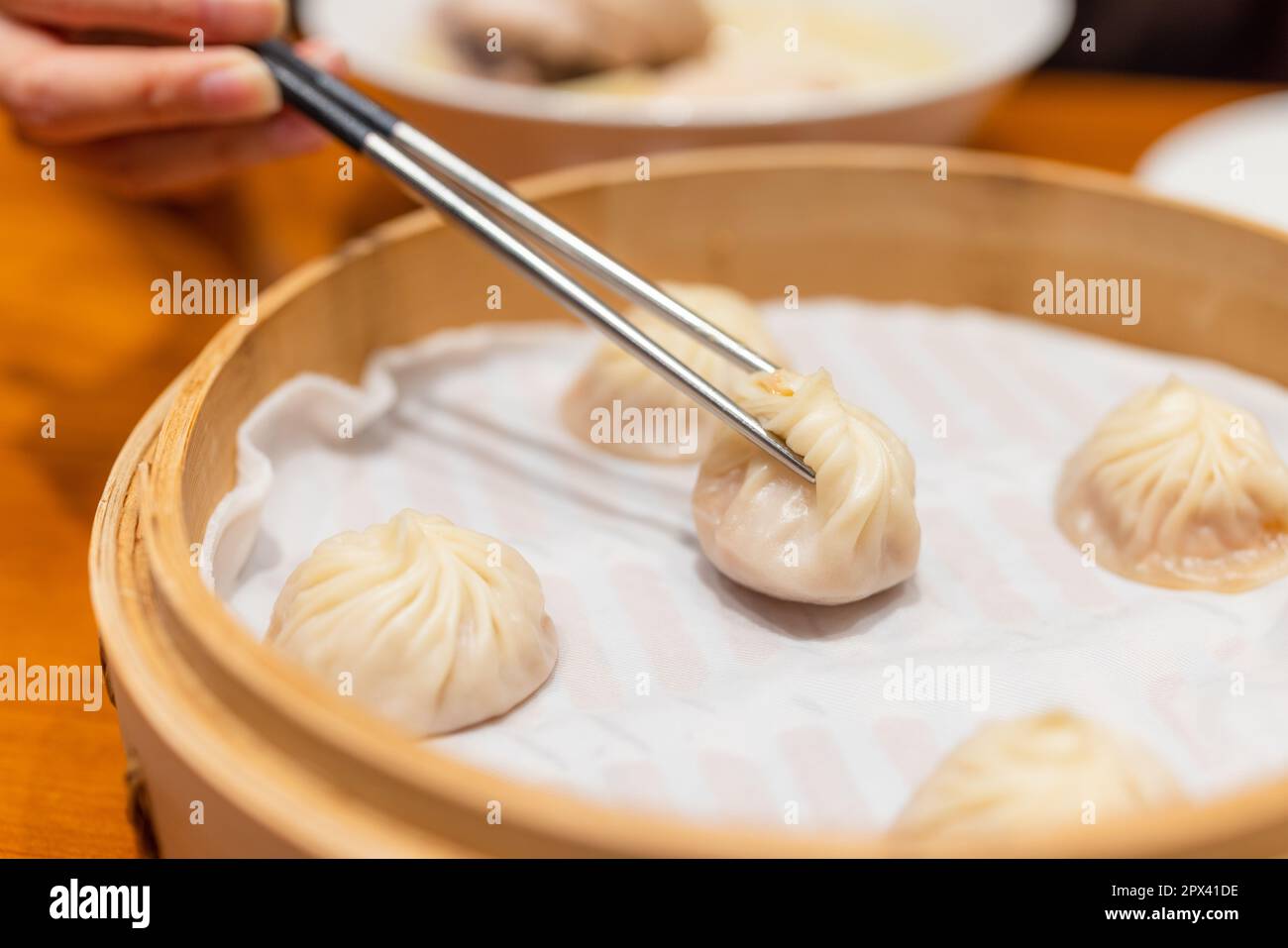 Chinese style steamed soup bun in restaurant Stock Photo - Alamy