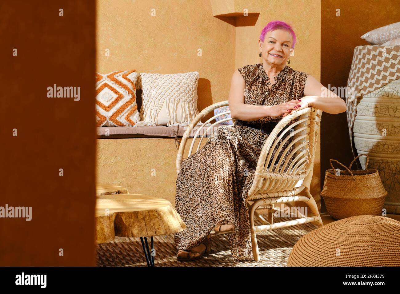 Retired woman sits in authentic middle eastern style interior Stock ...