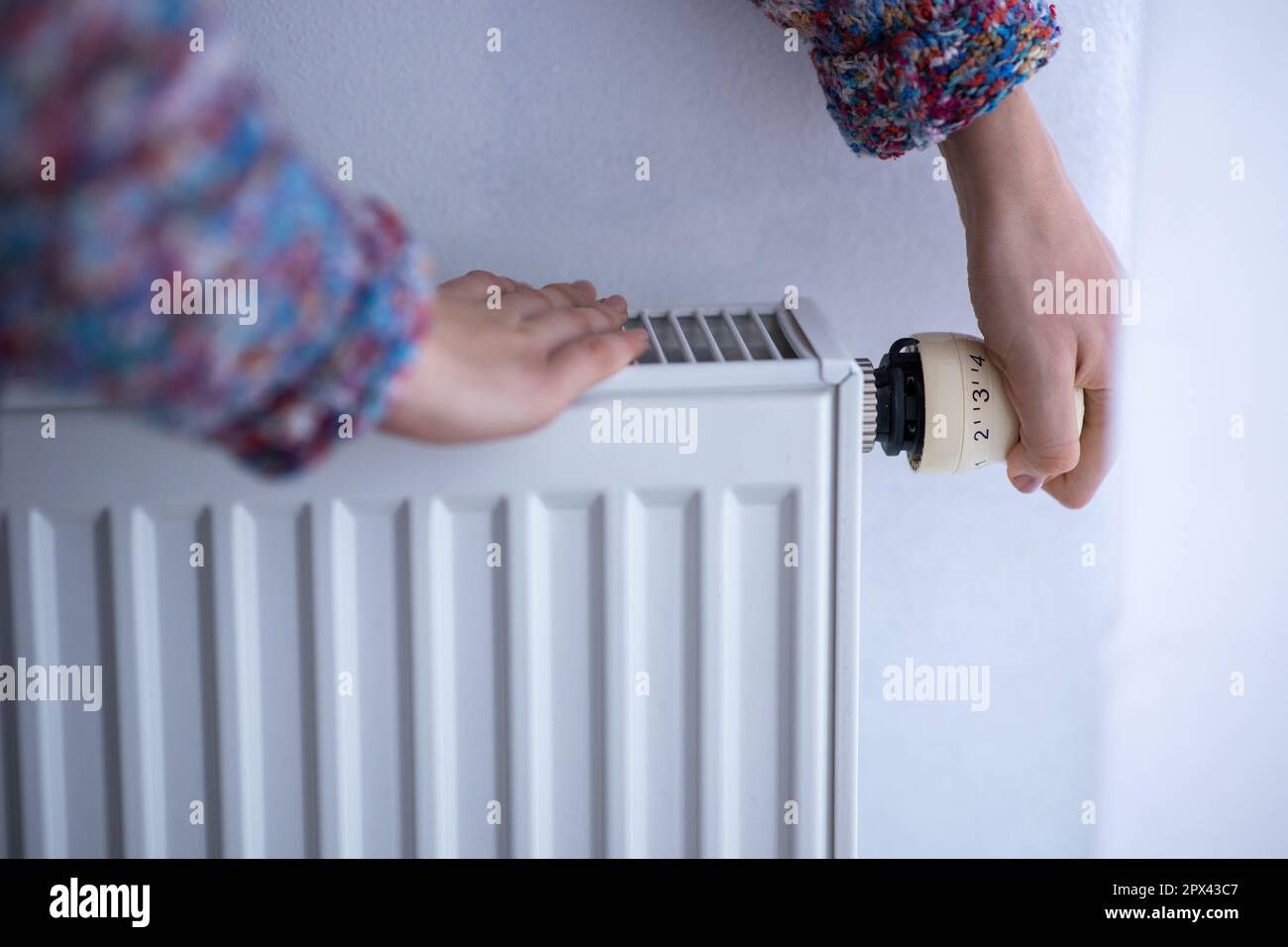 Cold, depressed mid-aged woman at home feeling sad, lonely, anxious ...