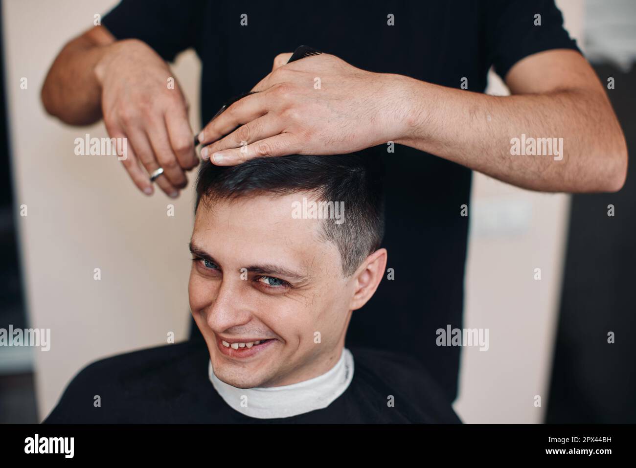 Barbershop mens haircut close up hi-res stock photography and images ...