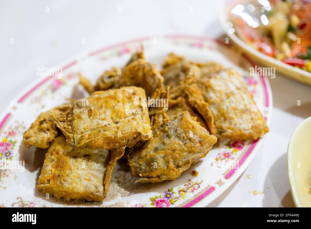 Deep fry crispy fish fillet in restaurant Stock Photo - Alamy