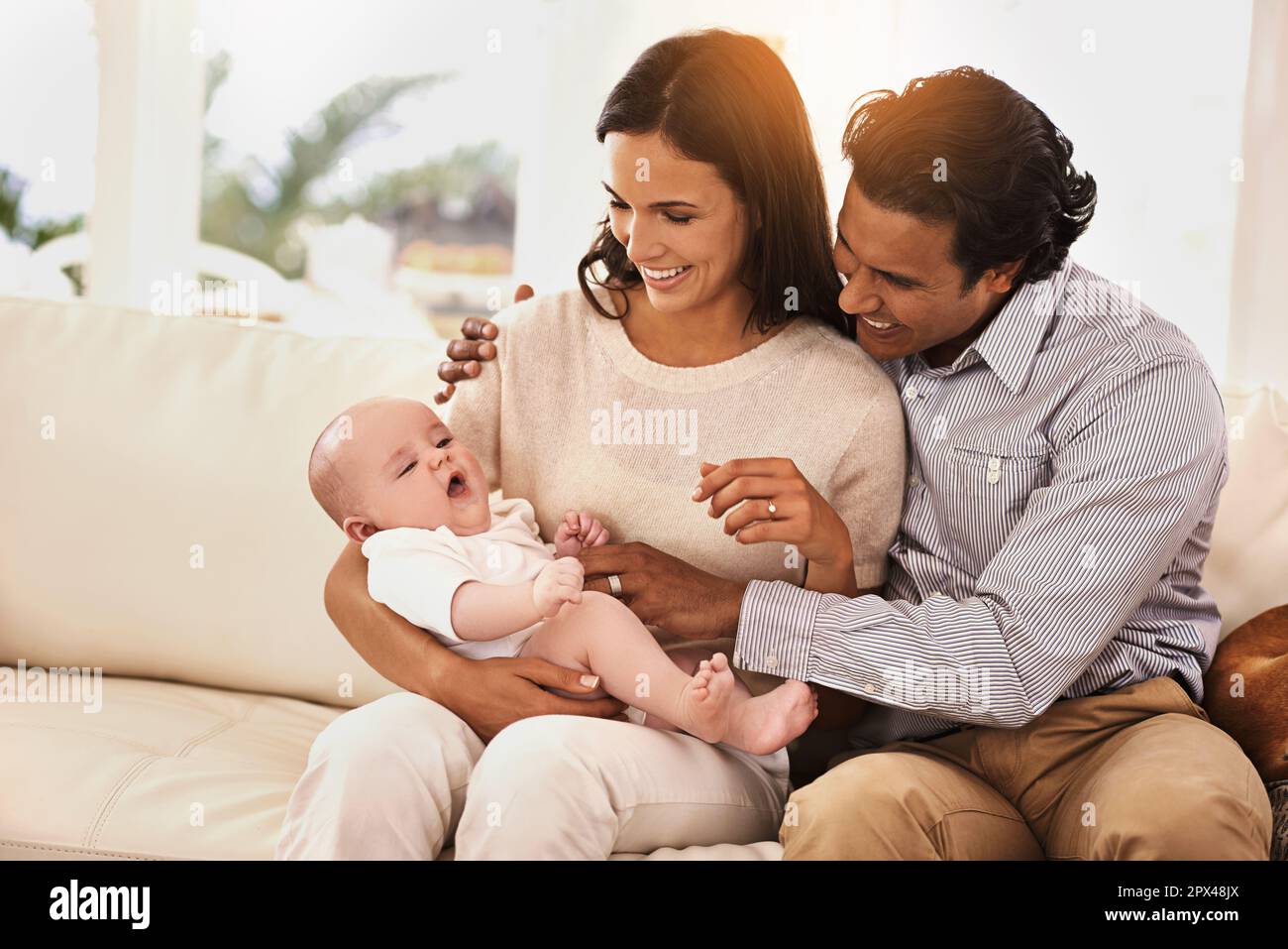 When your family grows, so does the love. an affectionate couple and ...