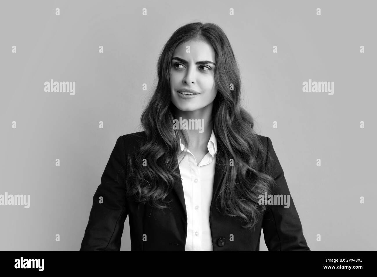 Negative business woman isolated over gray background. Displeased angry ...