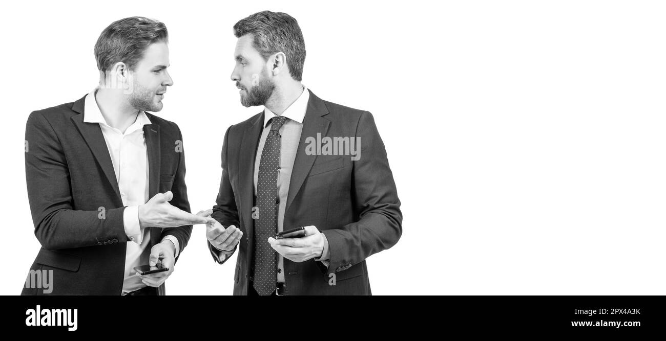 live communication. two colleagues discussing business hold phone ...