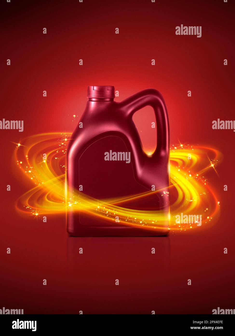 Bottle engine oil on a red black background Stock Photo - Alamy
