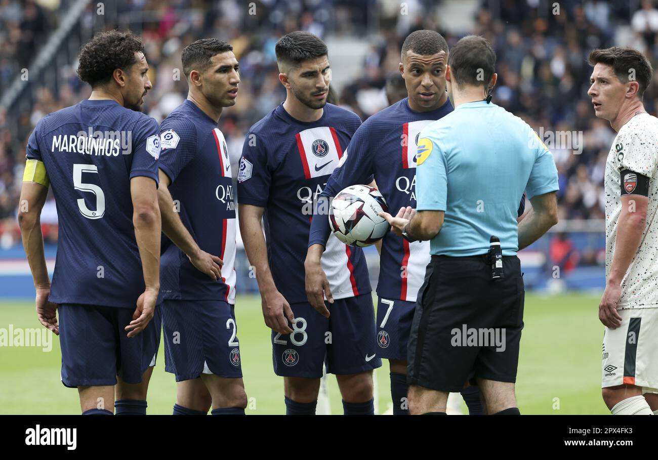 Marquinhos, Achraf Hakimi, Carlos Soler, Kylian Mbappe of PSG argue with referee Jerome Brisard ...