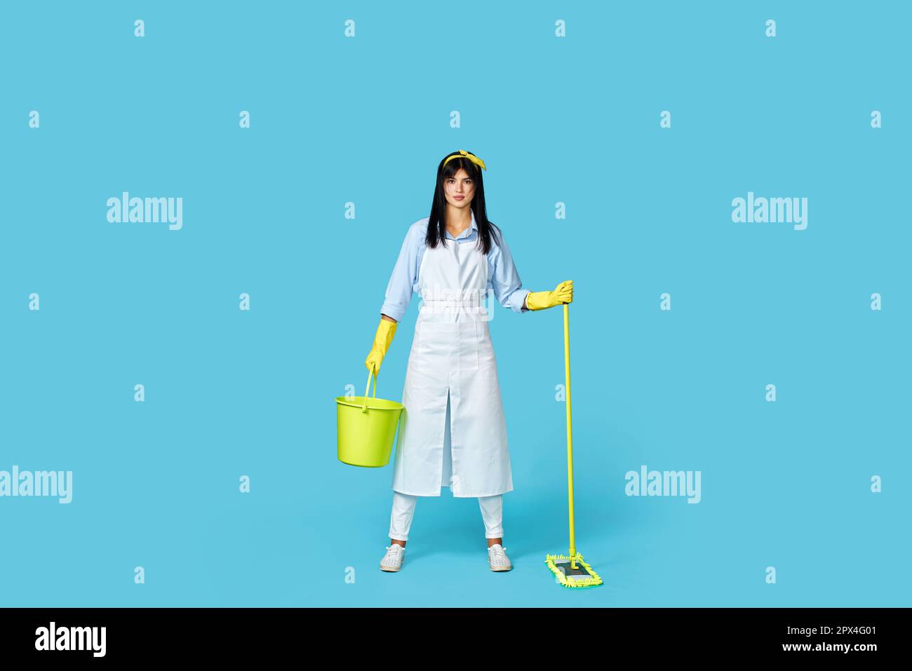 positive cheerful professional cleaner woman in rubber gloves and ...