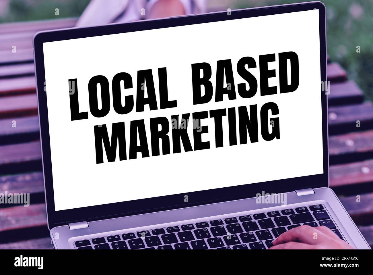 Hand writing sign Local Based Marketing, Word Written on marketing way ...