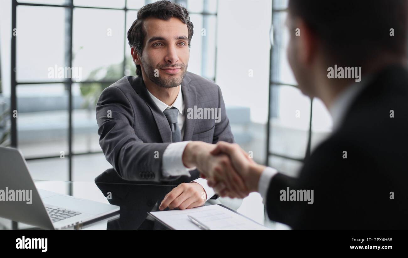 Employer, boss hiring candidate after successful job interview Stock ...