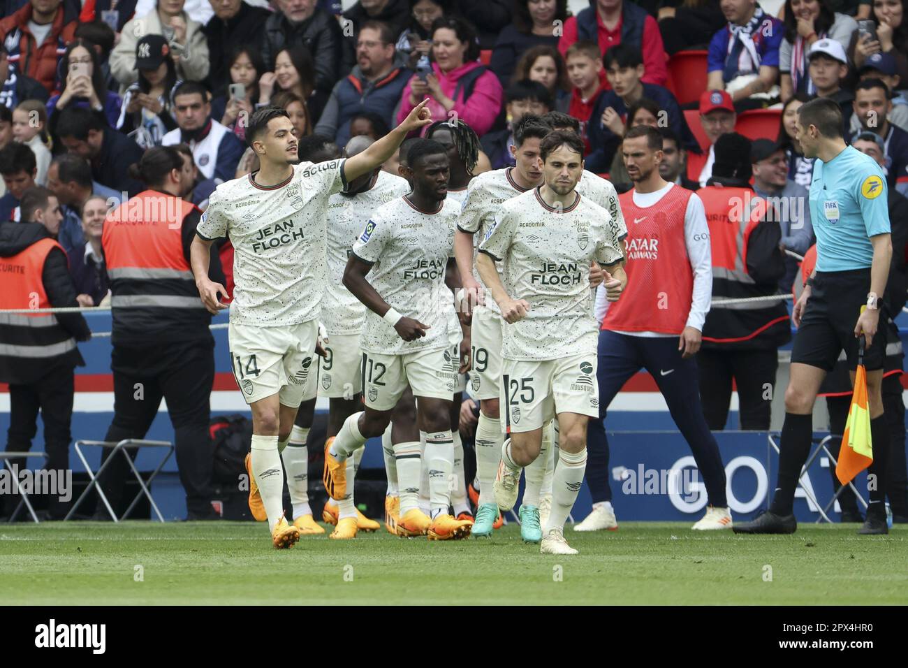 Romain Faivre of Lorient #14 celebrates his goal with teammates during ...