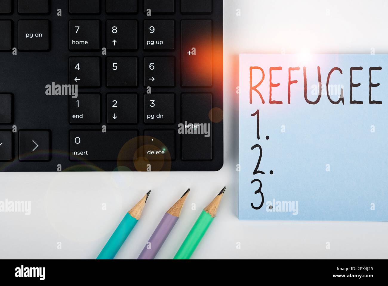 Hand writing sign Refugee, Business concept refer to movements of large ...