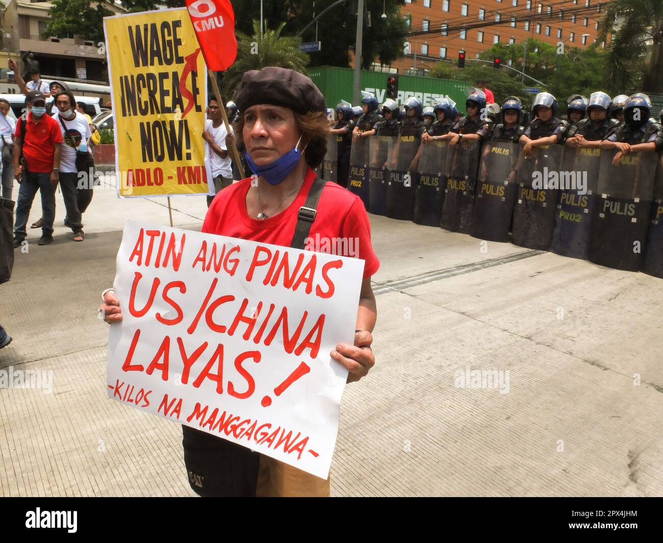 Manila, Philippines. 01st May, 2023. A protester holds a placard, while ...