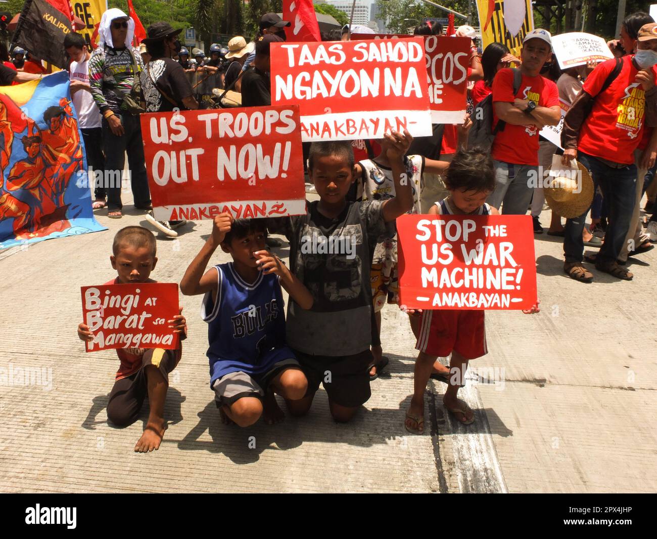 Manila, Philippines. 01st May, 2023. Street children hold placards ...