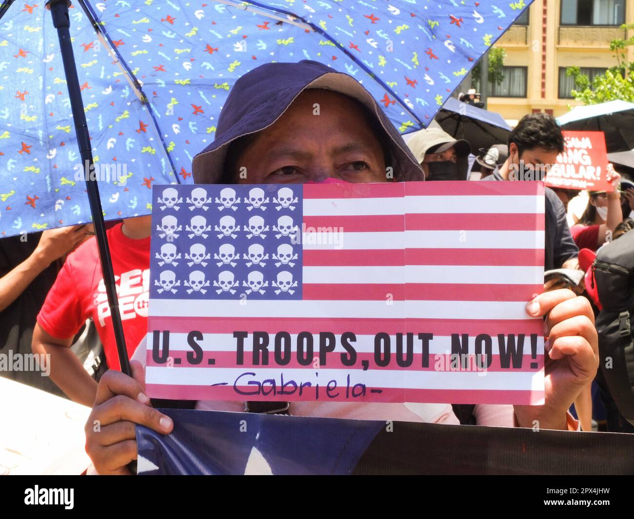 Manila, Philippines. 01st May, 2023. A female protester holds a placard ...
