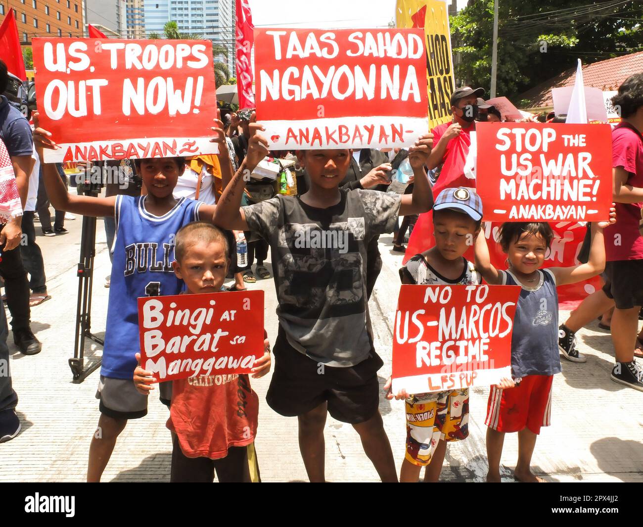 Manila, Philippines. 01st May, 2023. Street children hold placards ...