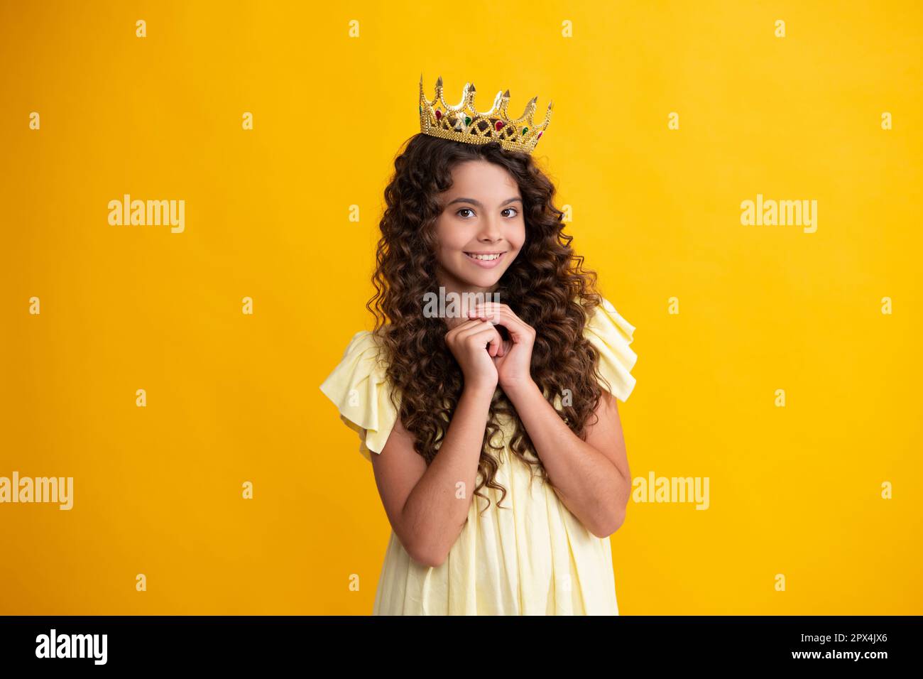 Portrait of ambitious teenage girl with crown, feeling princess ...