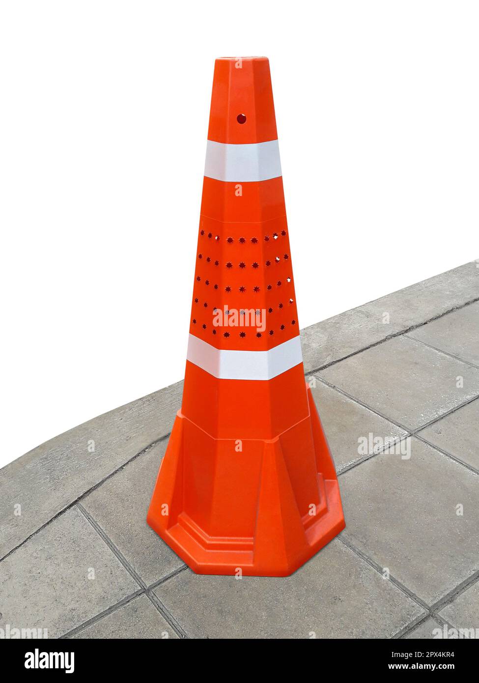 Traffic cone on the sidewalk isolated on white background Stock Photo ...
