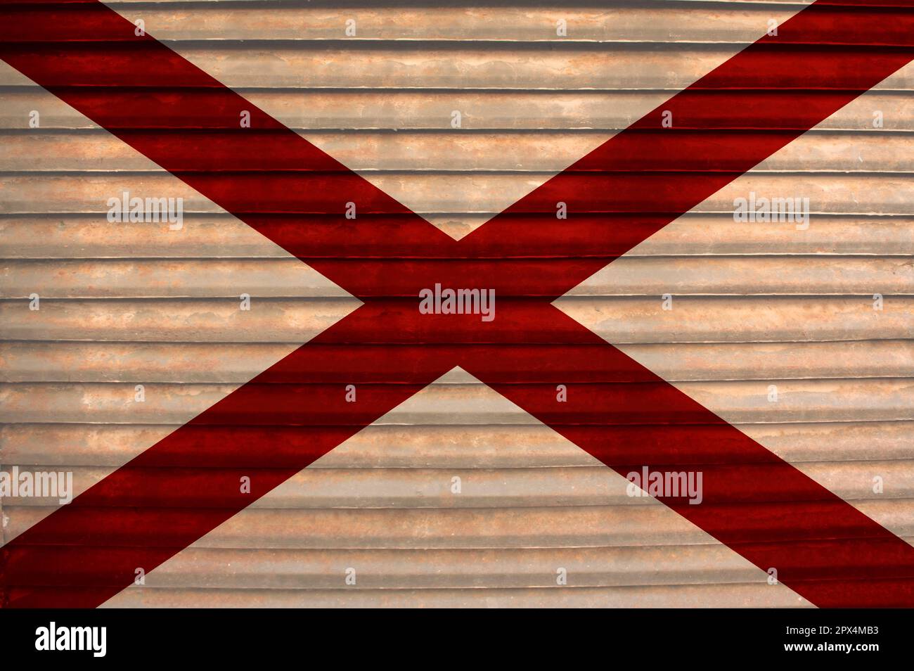 The flag of the United States stae Alabama painted ontp a rusty metal ...
