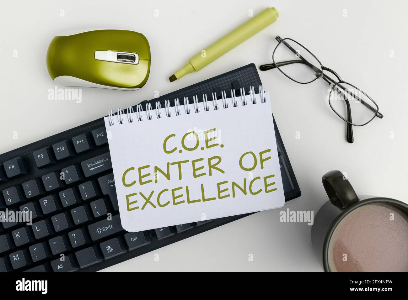 Sign displaying C.O.E. Center Of Excellence, Internet Concept being ...