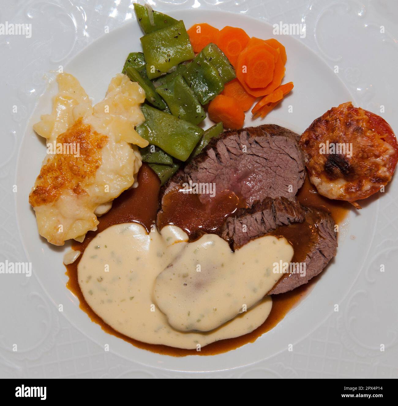 Close up of a typical German main course with slices of roast ...
