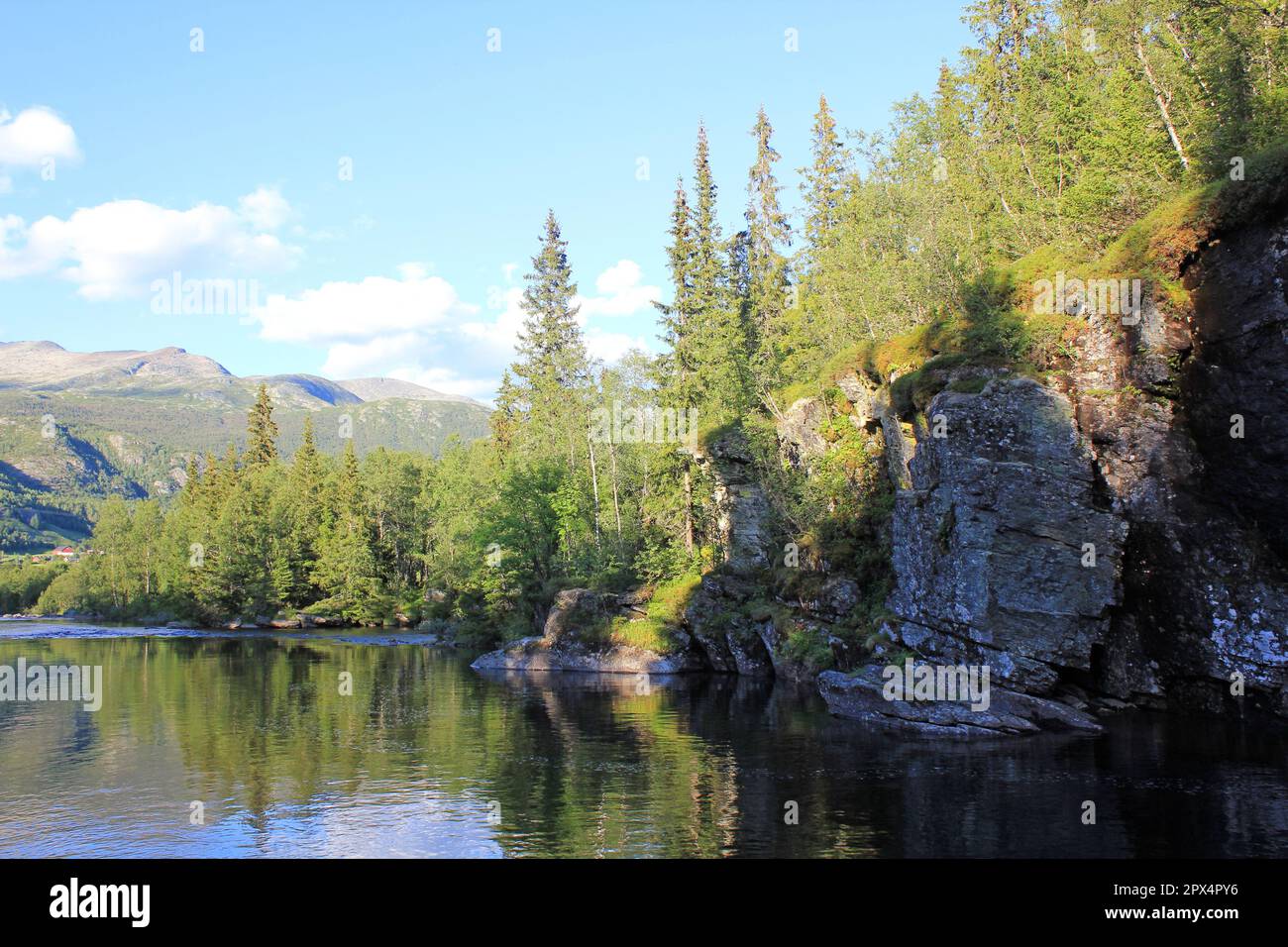 Fast flowing river water of the waterfall Rjukandefossen in Hemsedal ...